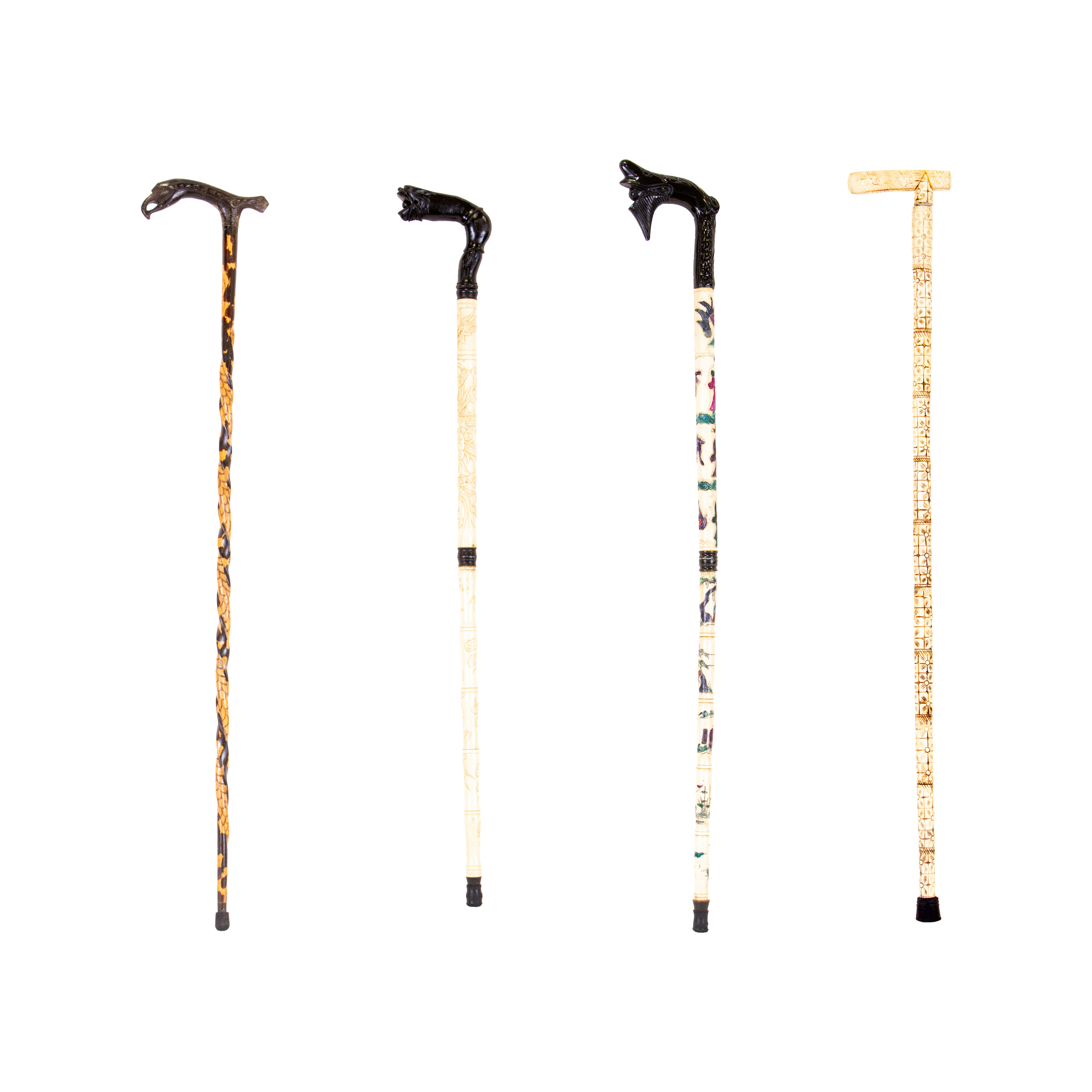 - A lot of carved and painted wood and bone walking canes