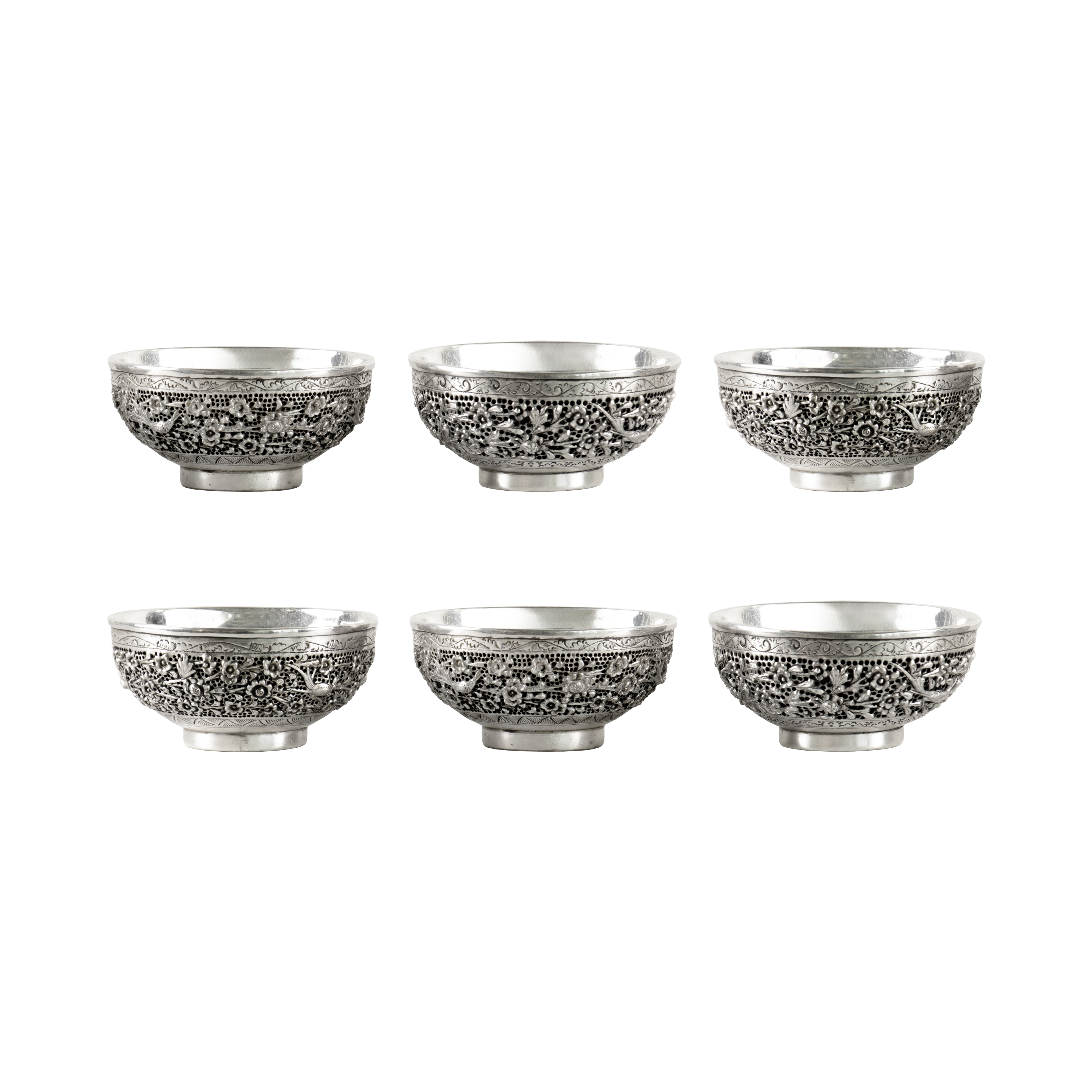 - A lot of six intricately decorated silver rice bowls