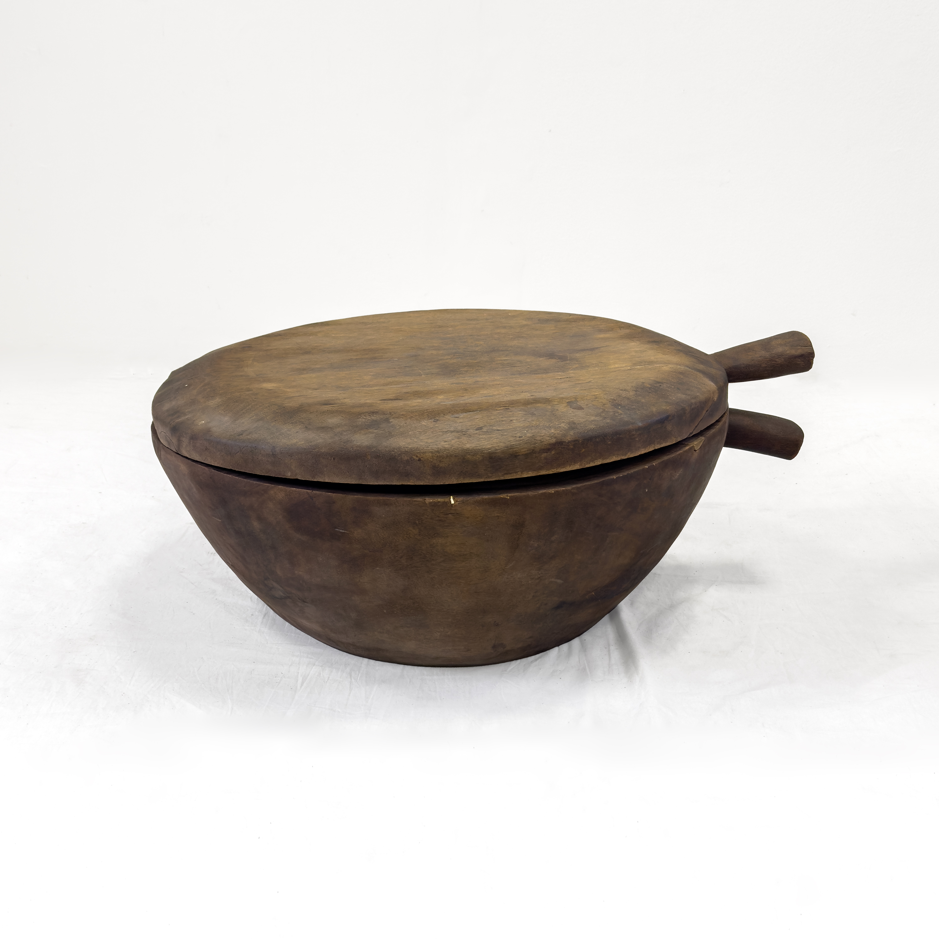 - A large Bontoc wooden rice container
