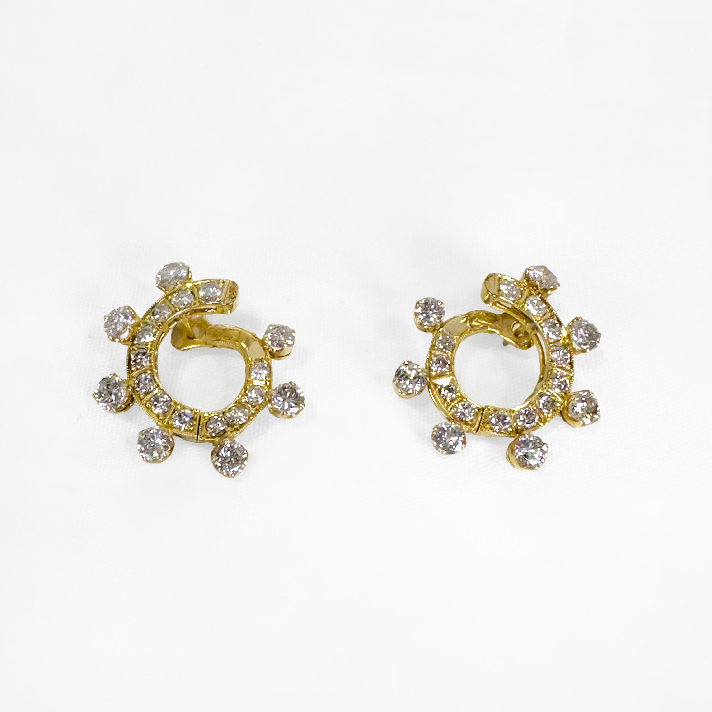 - A pair of 'Diwa' earrings