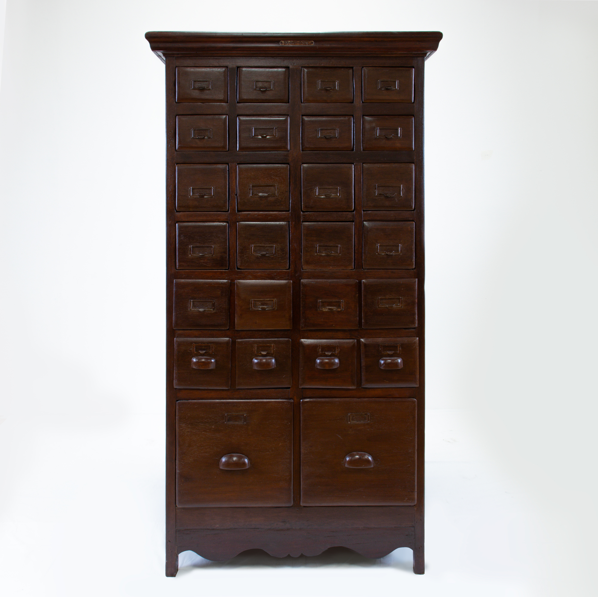 - A 24-drawer index card cabinet with unusual large bottom drawers