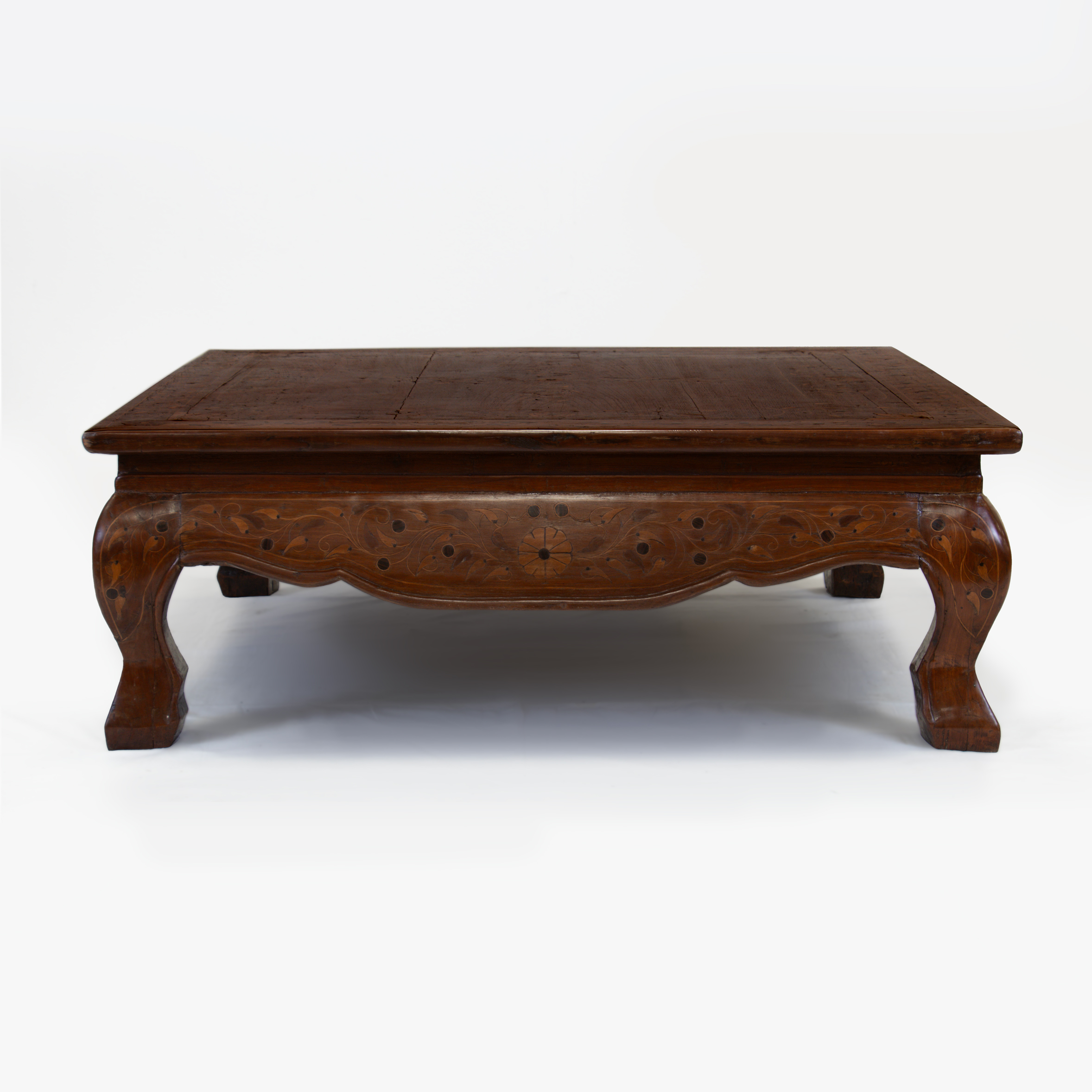- A very large square center table with ornate floral inlays